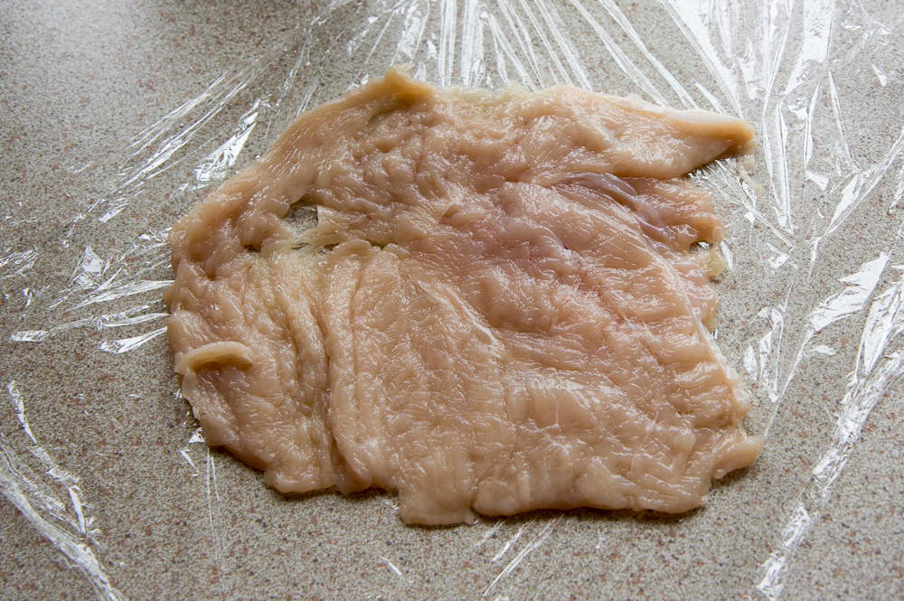 Spicy Chicken Roulade with a Mango Salad and Dressing. Served on a bed ...